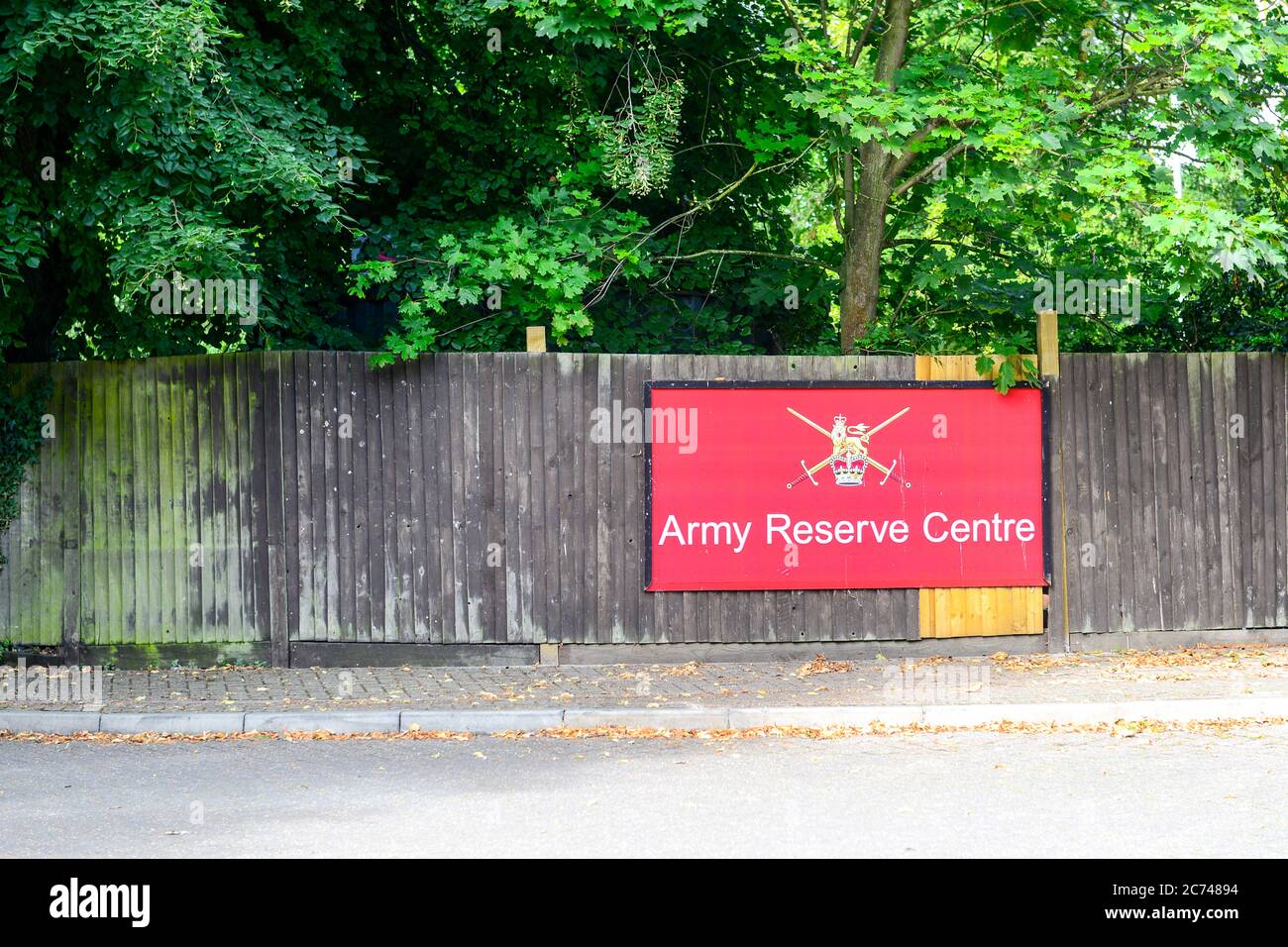 cambridge , Uk, 13-072020, large red sign secured onto wooden fence ...