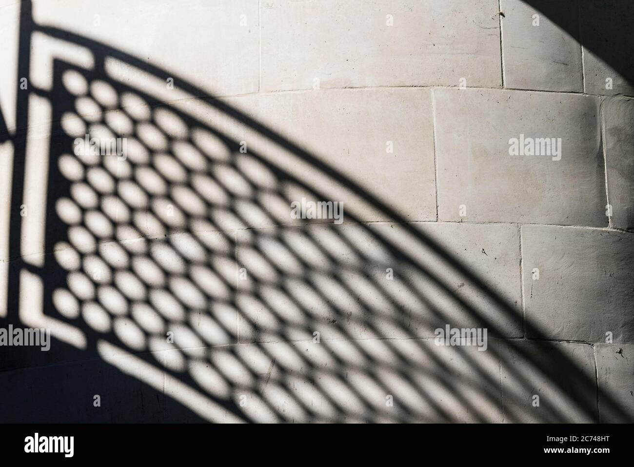Shadow on the stone work of Kingston Bridge, Surrey Stock Photo - Alamy