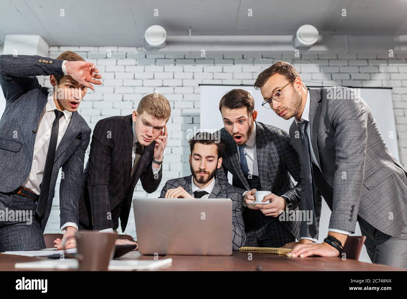 surprised business team brainstorming in modern executive office, group ...