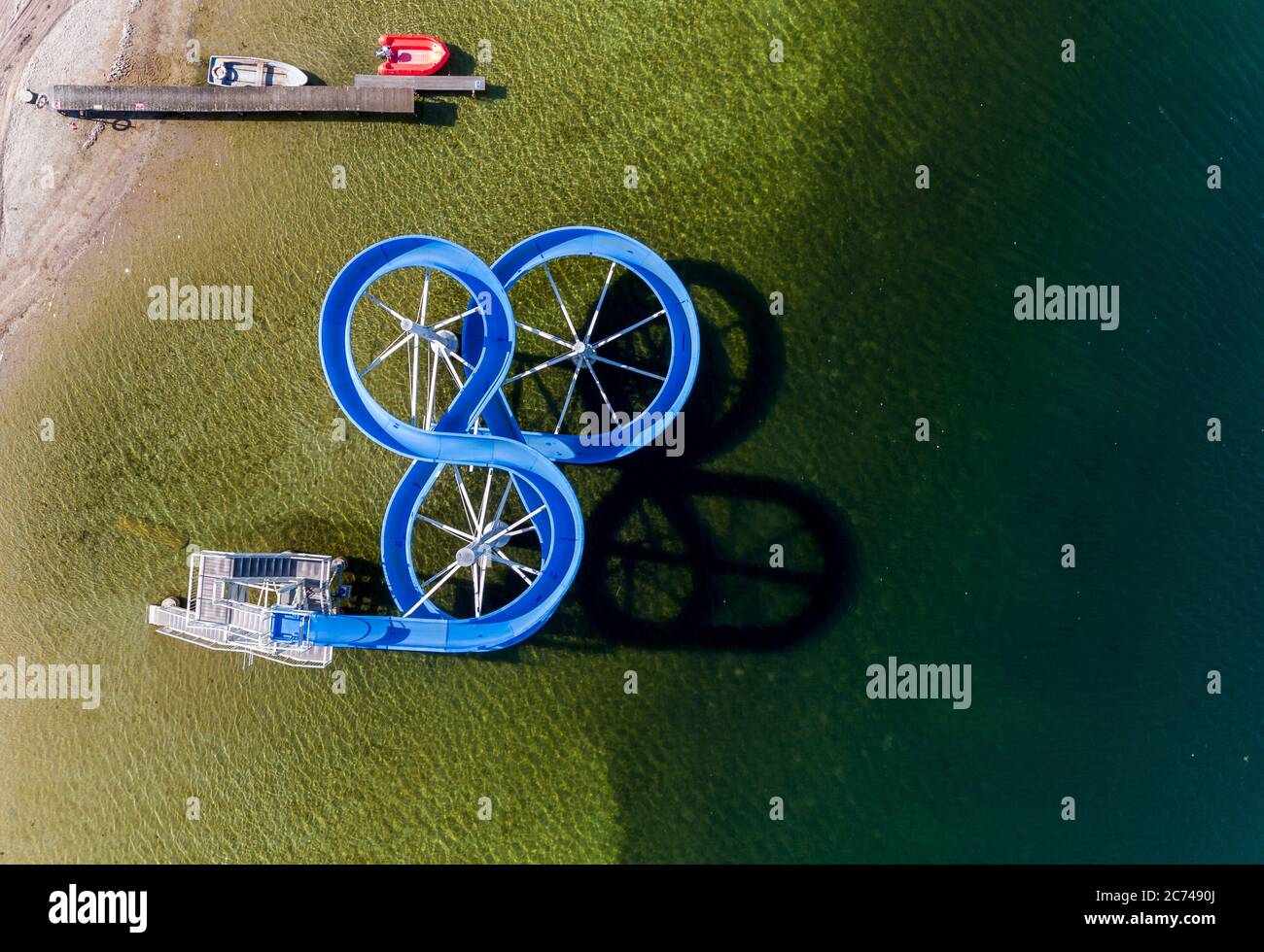 14 July 2020, Saxony-Anhalt, Roßbach: A 90 metre long giant slide is ...