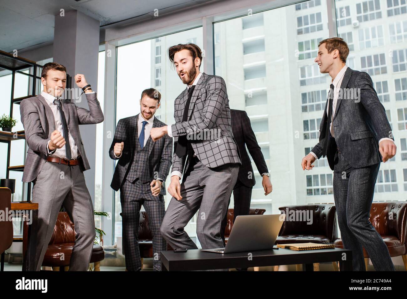 happy dancing business team happy to be a part of successful team ...