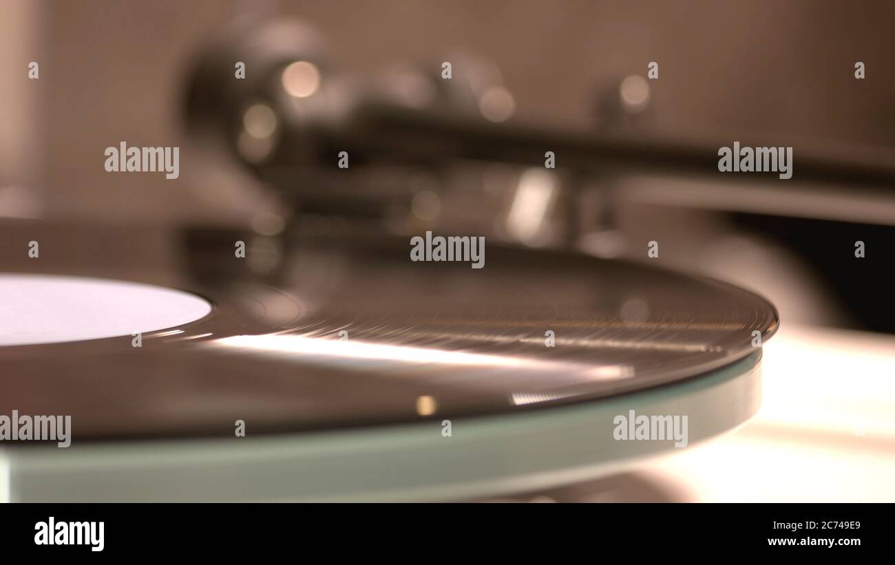 Vintage record is playing by the gramophone Stock Photo - Alamy
