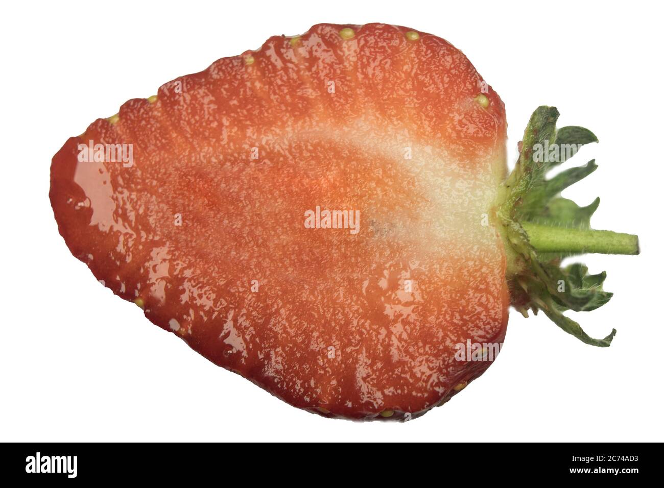Cut strawberry slice surface close up macro isolated Stock Photo - Alamy