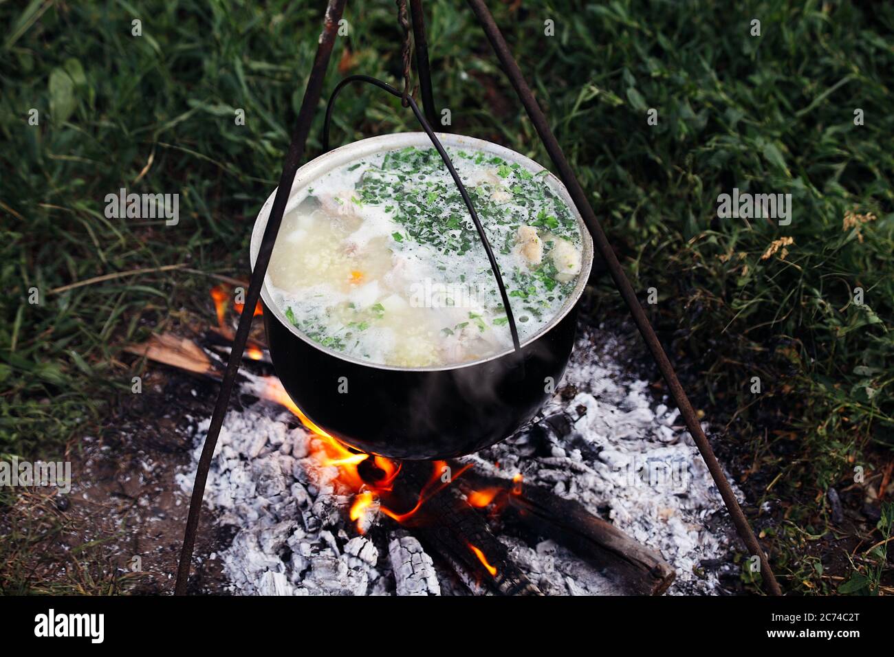 Wood fire cooking vegetable soup hi-res stock photography and images ...