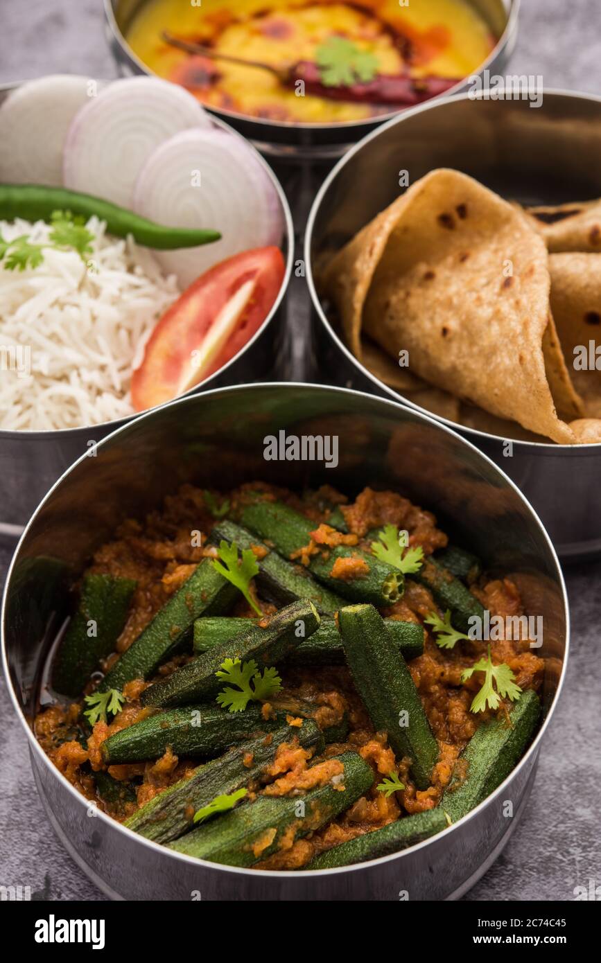 Indian vegetarian Lunch Box or Tiffin made up of stainless steel for ...
