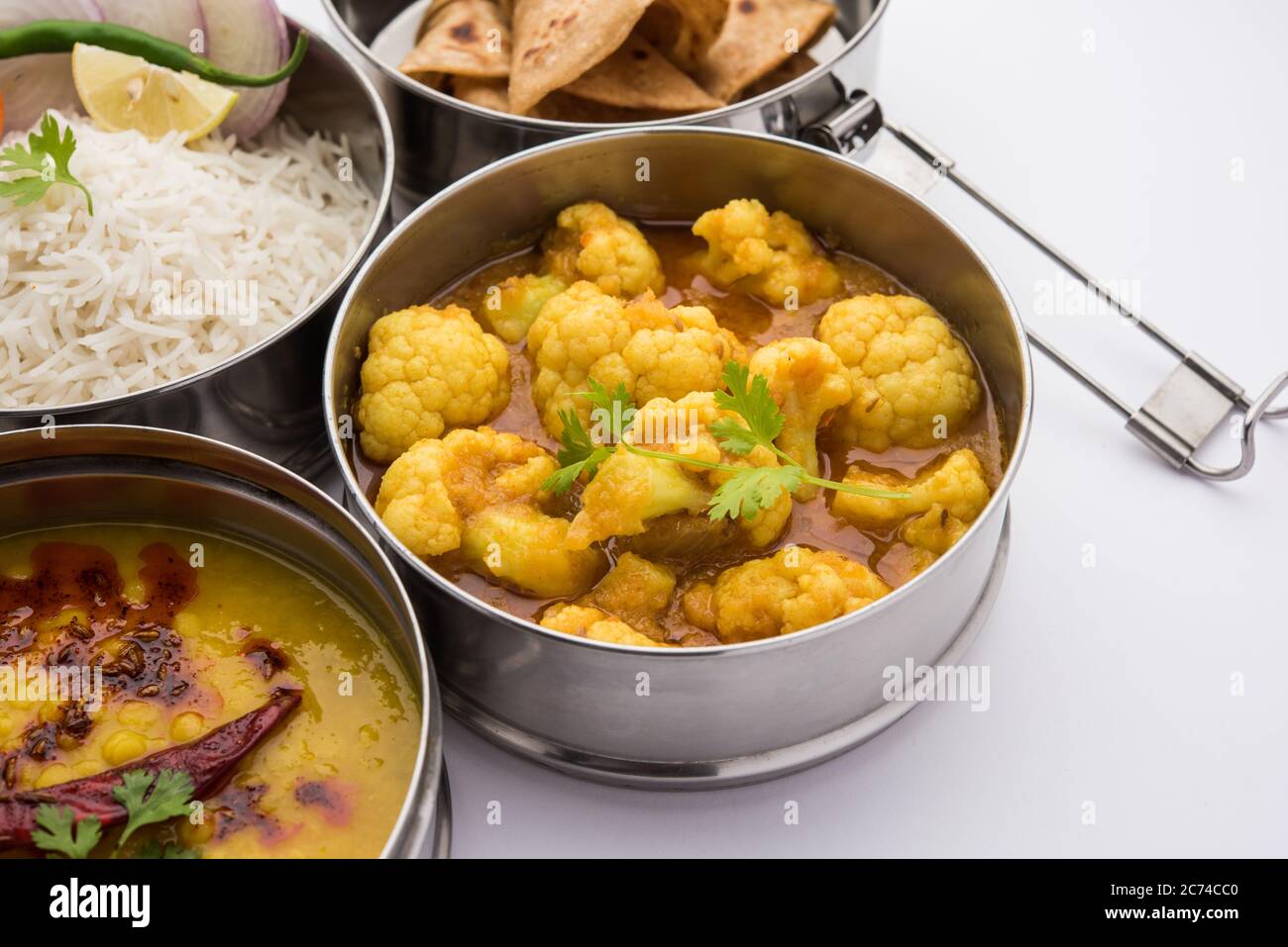 Indian vegetarian Lunch Box or Tiffin made up of stainless steel for ...