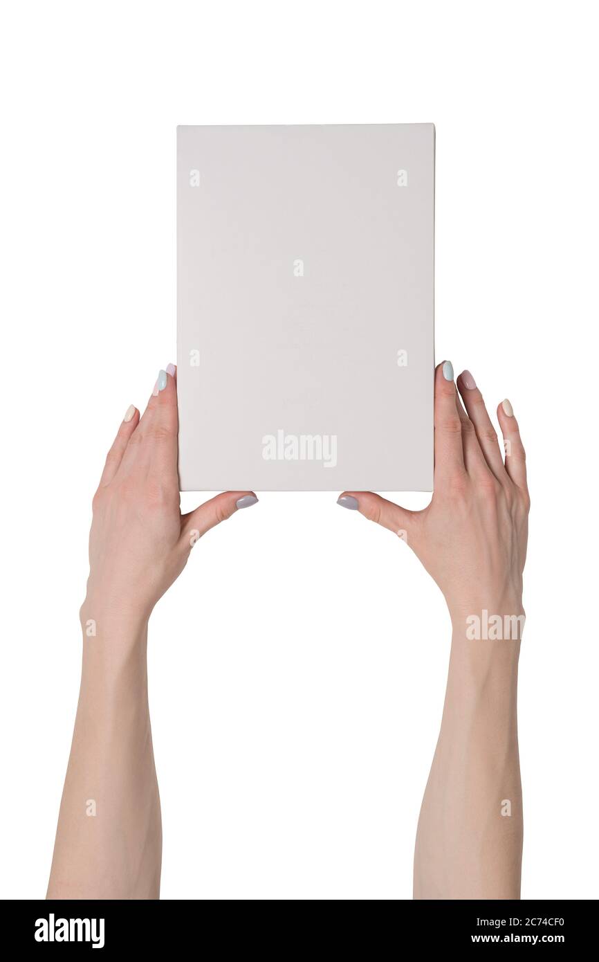 White rectangular box in female hands. Top view. Isolate Stock Photo ...