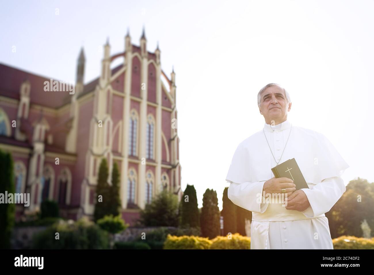 Catholic priest bible in worship hi-res stock photography and images ...