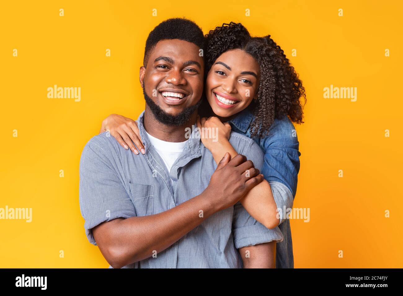 Portrait Of Cheerful African American Couple Posing To Camera Over ...