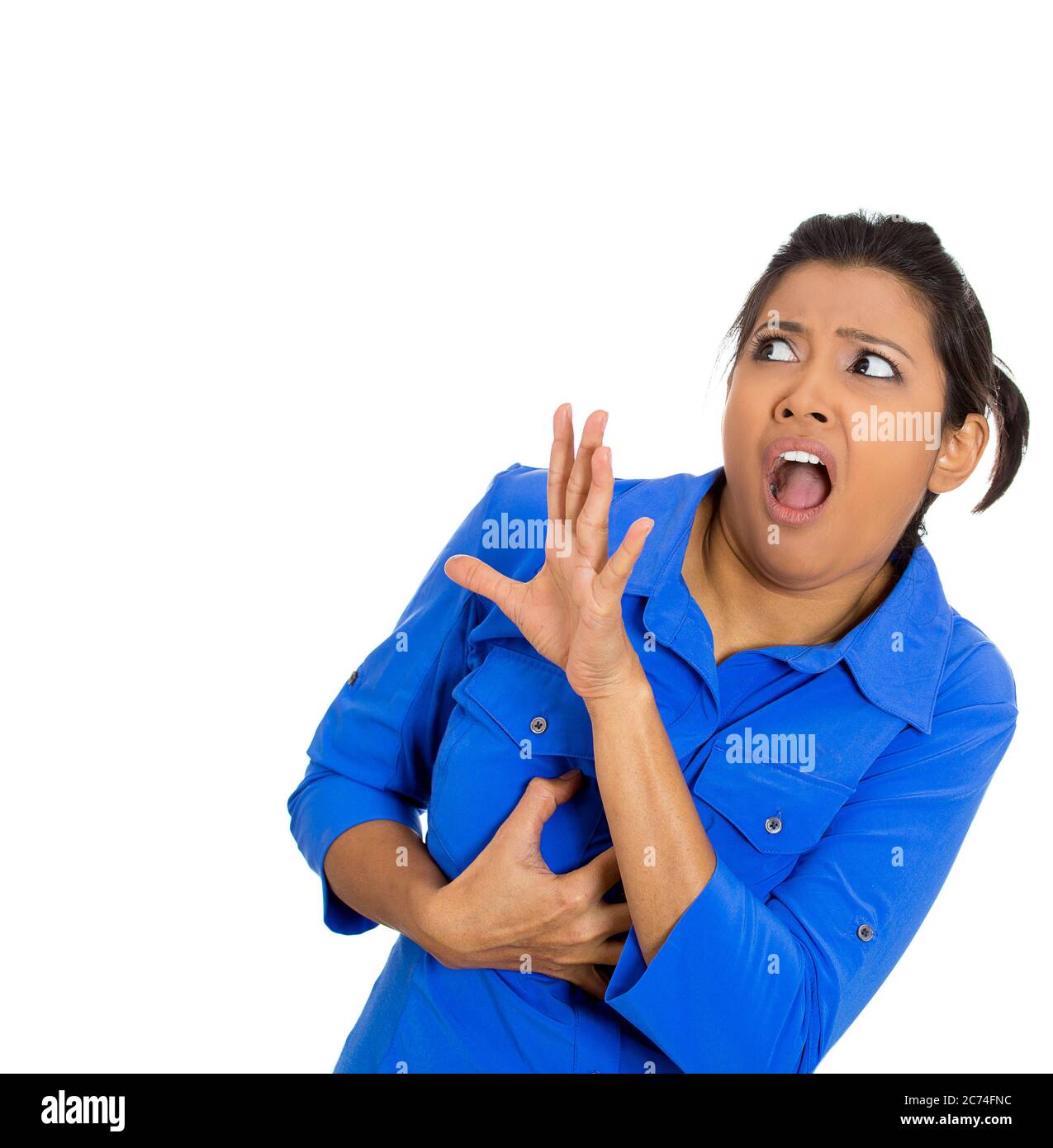 Portrait of a young woman looking scared and very anxious Stock Photo ...