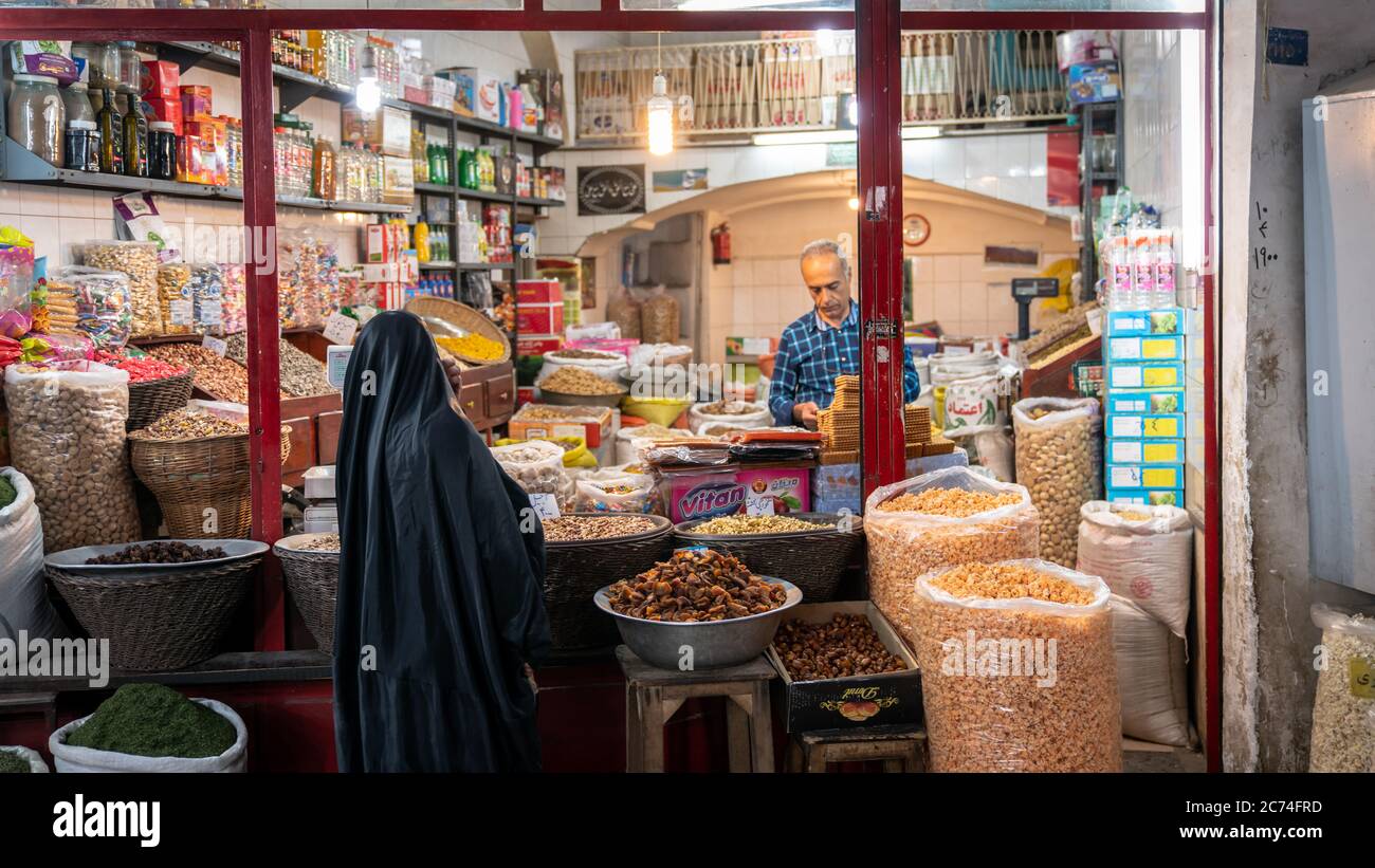 Isfahan, Iran - May 2019: Woman buying snacks from a shop in Grand ...