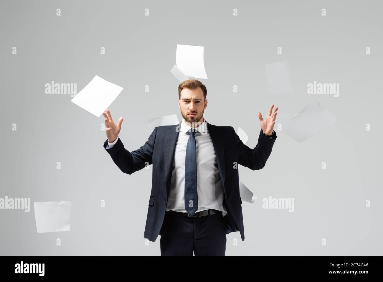 Throwing papers in the air hi-res stock photography and images - Alamy