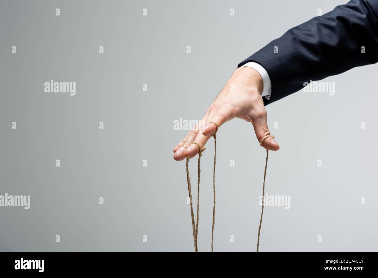 Puppet strings hand hi-res stock photography and images - Alamy