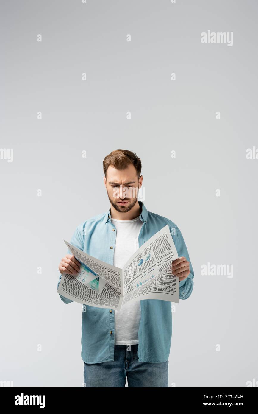 Reading newspaper confused hi-res stock photography and images - Alamy