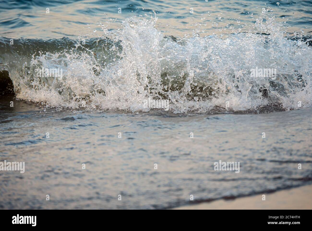 wave splash sea beach macro, close up Stock Photo - Alamy