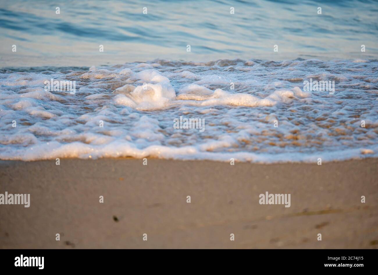 wave splash sea beach macro, close up Stock Photo - Alamy