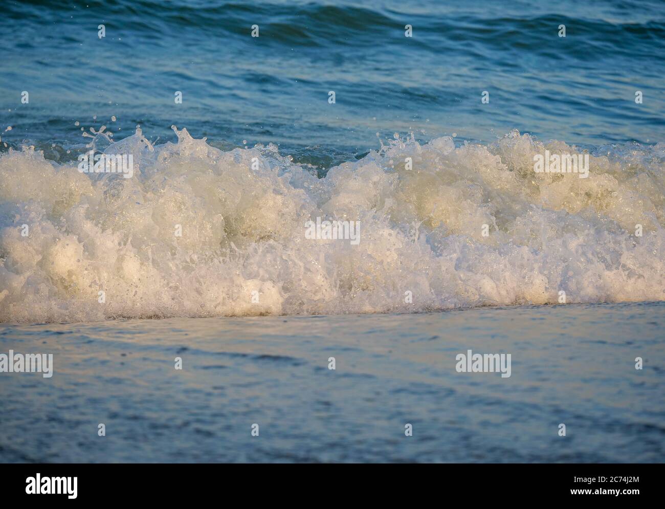 wave splash sea beach macro, close up Stock Photo - Alamy