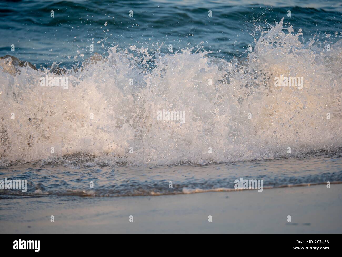 wave splash sea beach macro, close up Stock Photo - Alamy