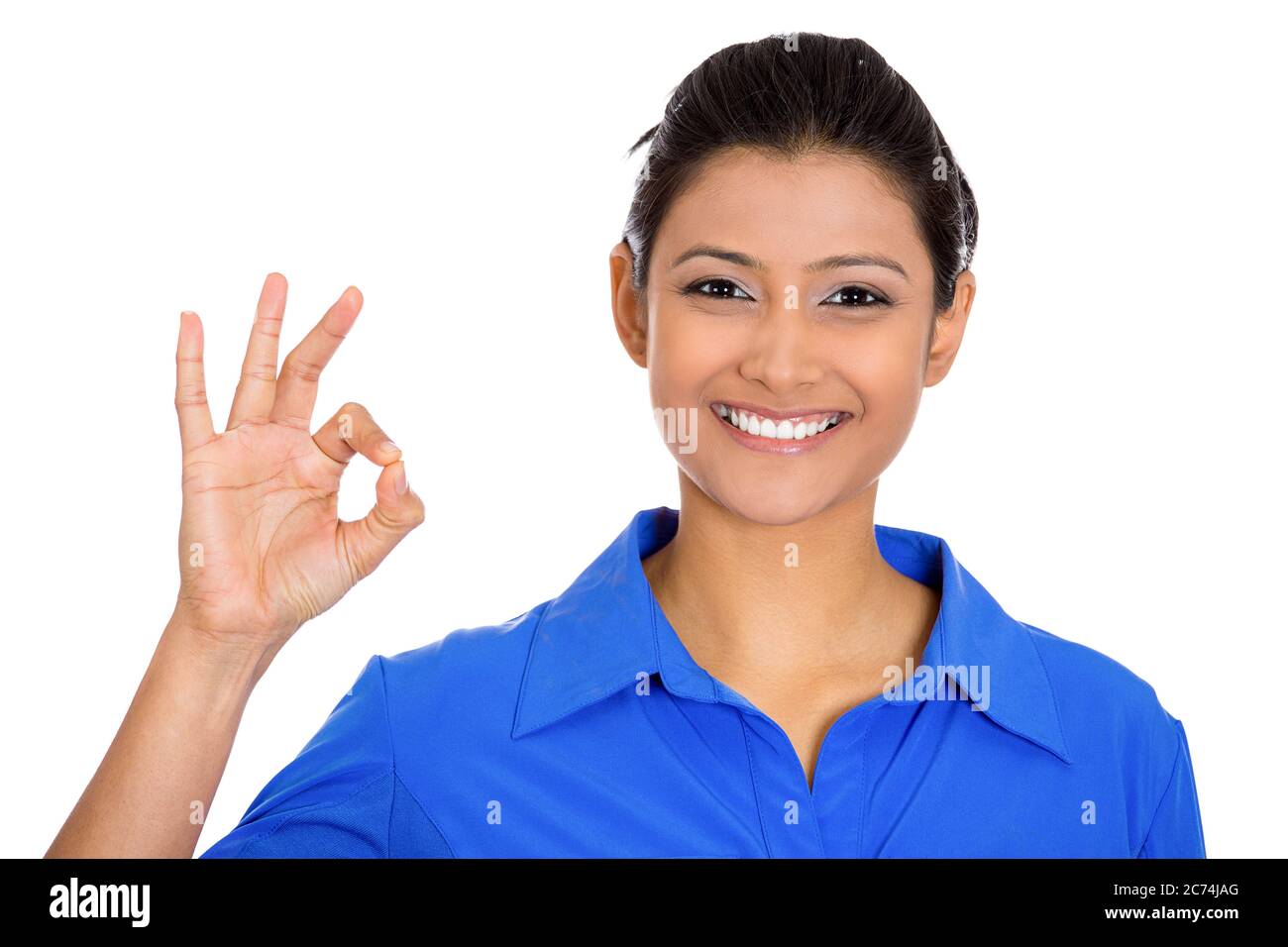 Closeup portrait of a happy, smiling excited woman giving OK sign with ...