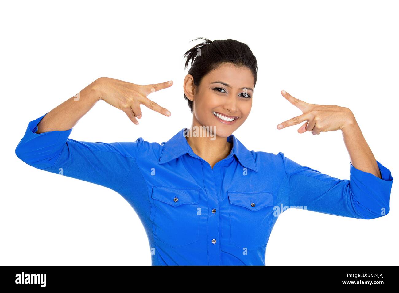 Portrait of a young happy confident woman giving peace victory or two ...