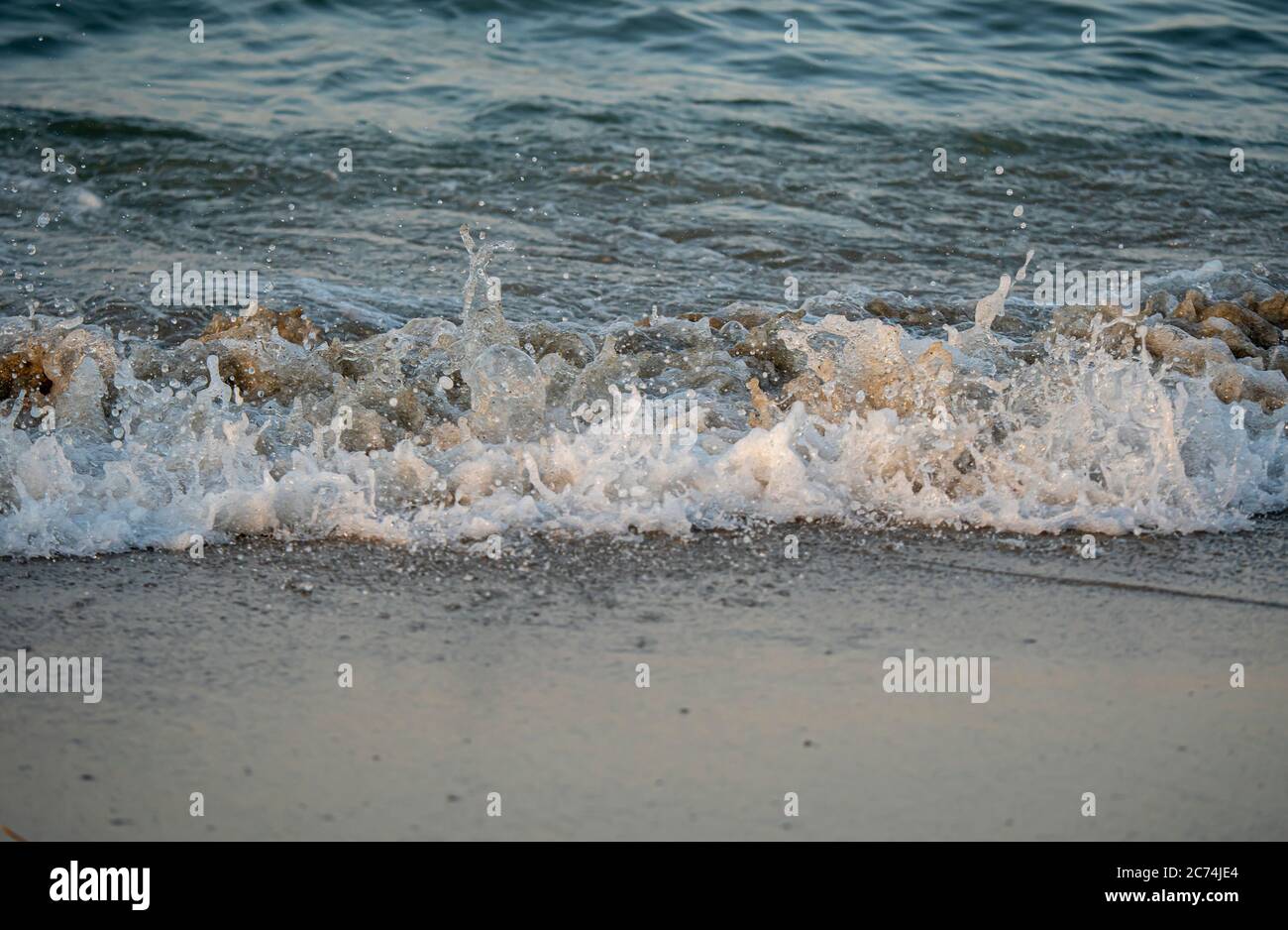 wave splash sea beach macro, close up Stock Photo - Alamy