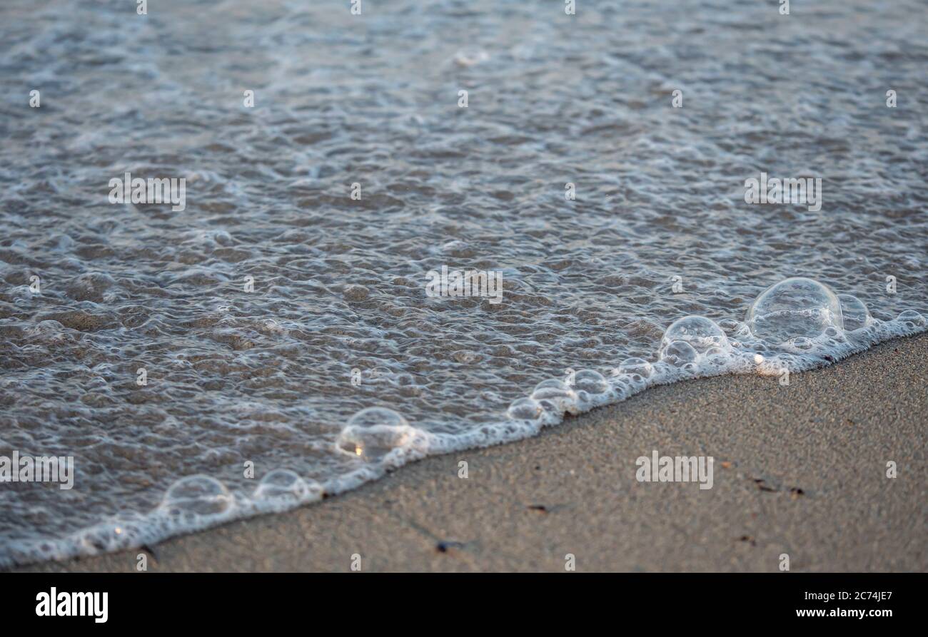 wave splash sea beach macro, close up Stock Photo - Alamy