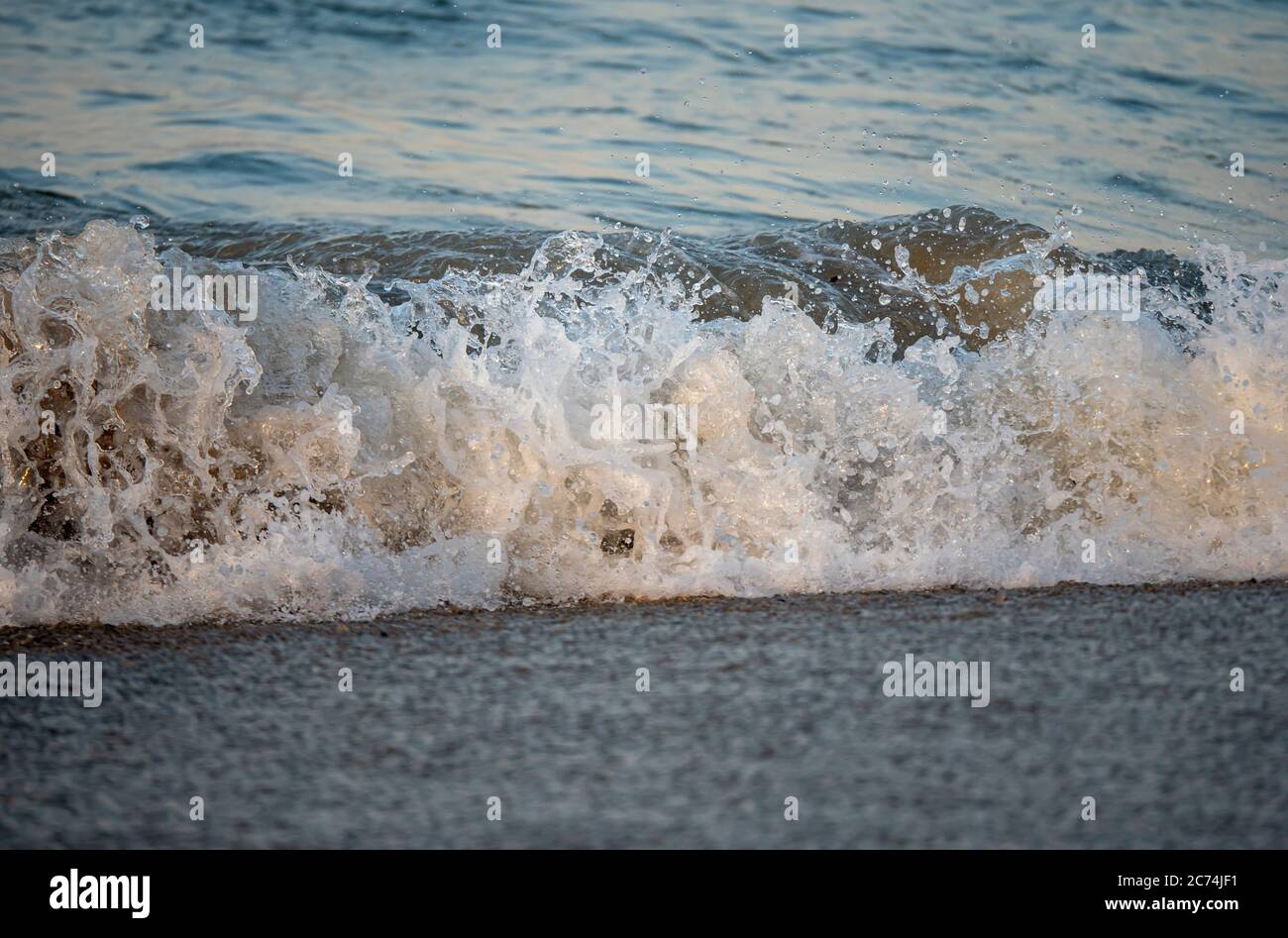wave splash sea beach macro, close up Stock Photo - Alamy