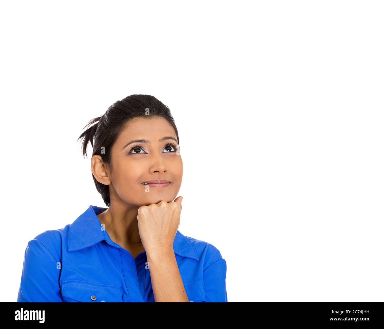 Portrait of a smiling young woman, student thinking looking up having ... Portrait of a smiling young woman, student thinking looking up having ...