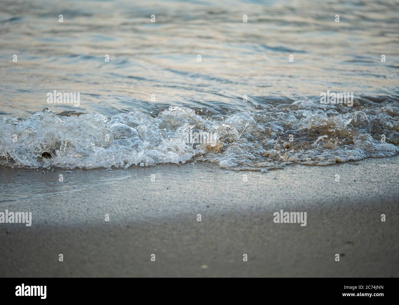 wave splash sea beach macro, close up Stock Photo - Alamy