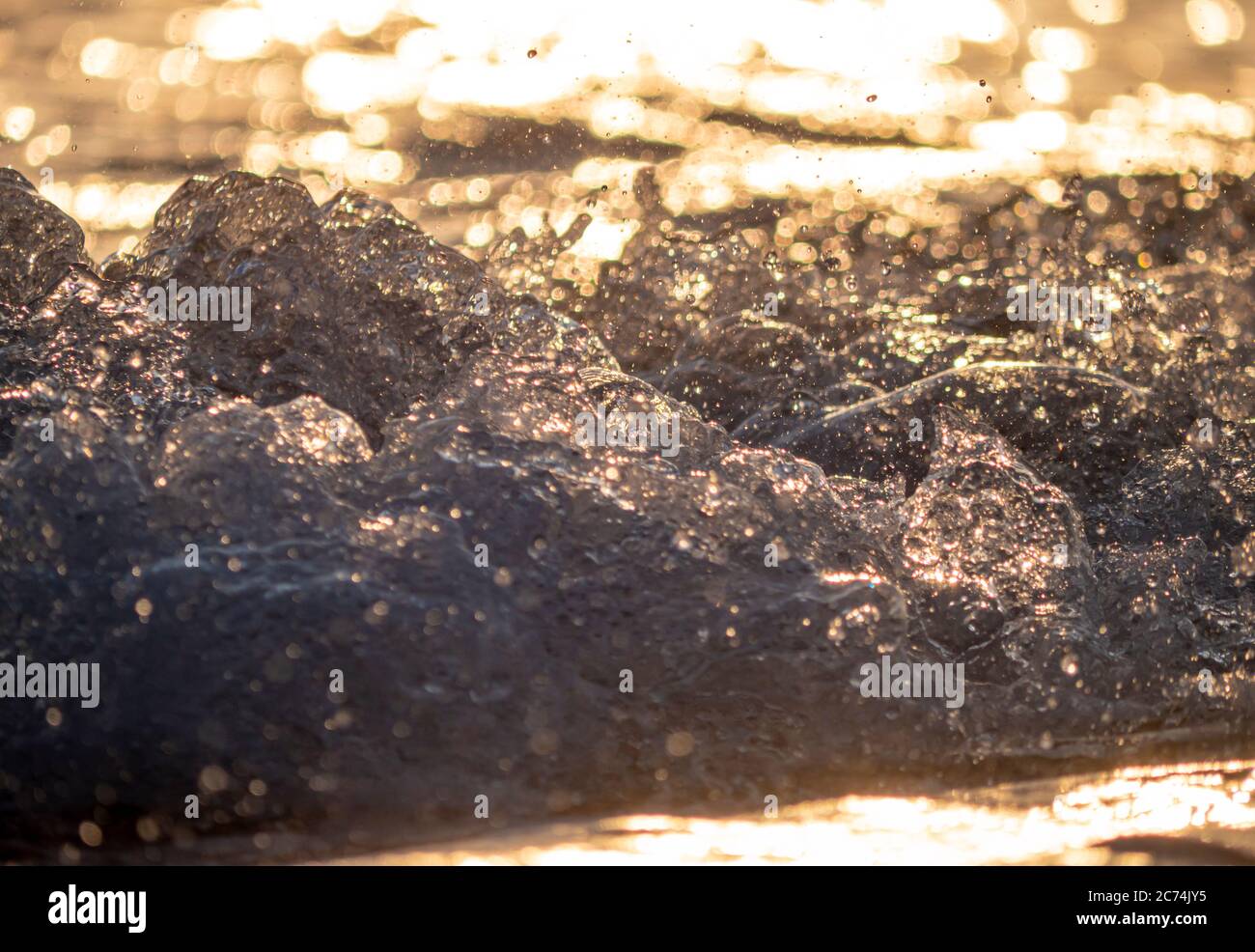 wave splash sea beach macro, close up Stock Photo - Alamy