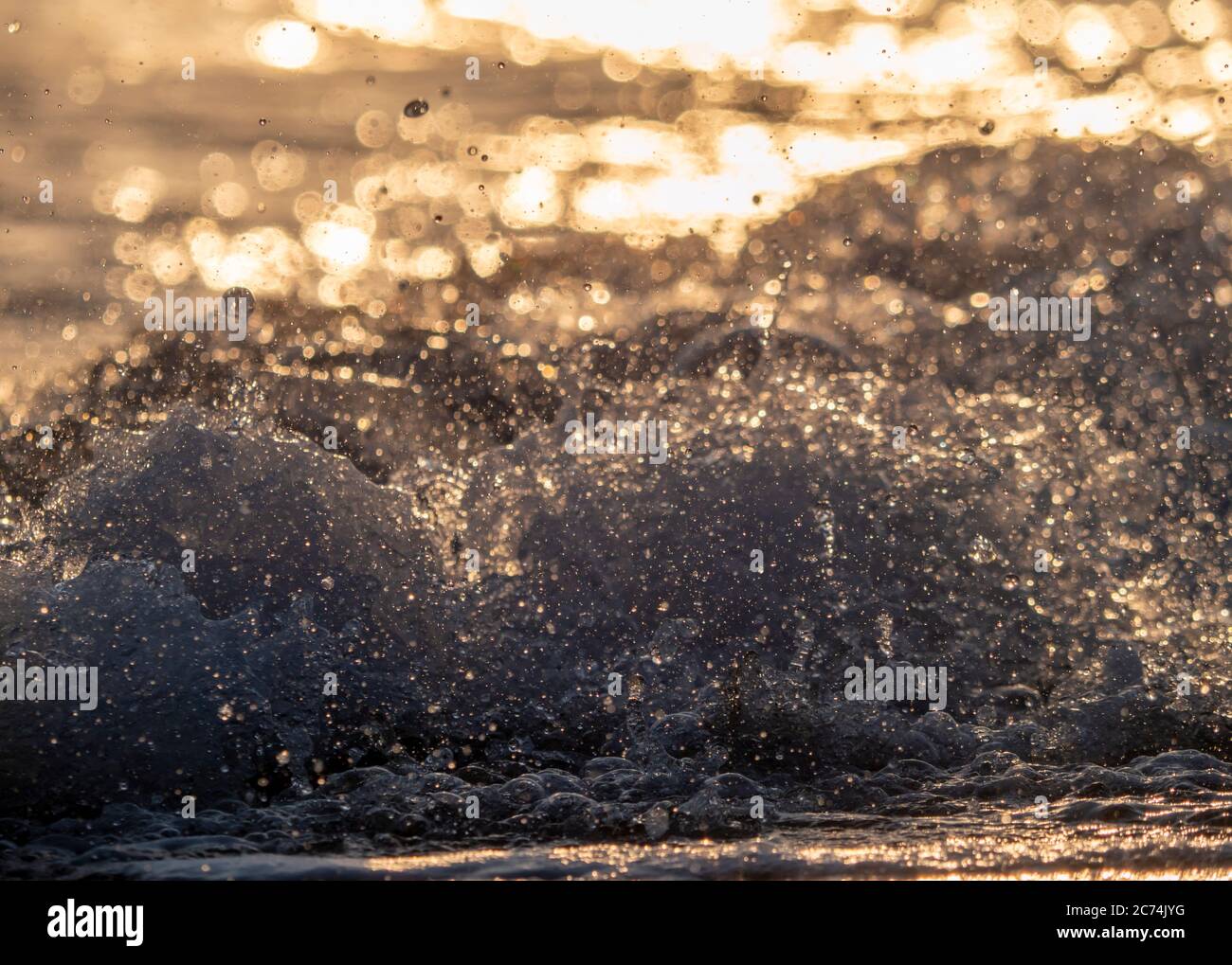 wave splash sea beach macro, close up Stock Photo - Alamy