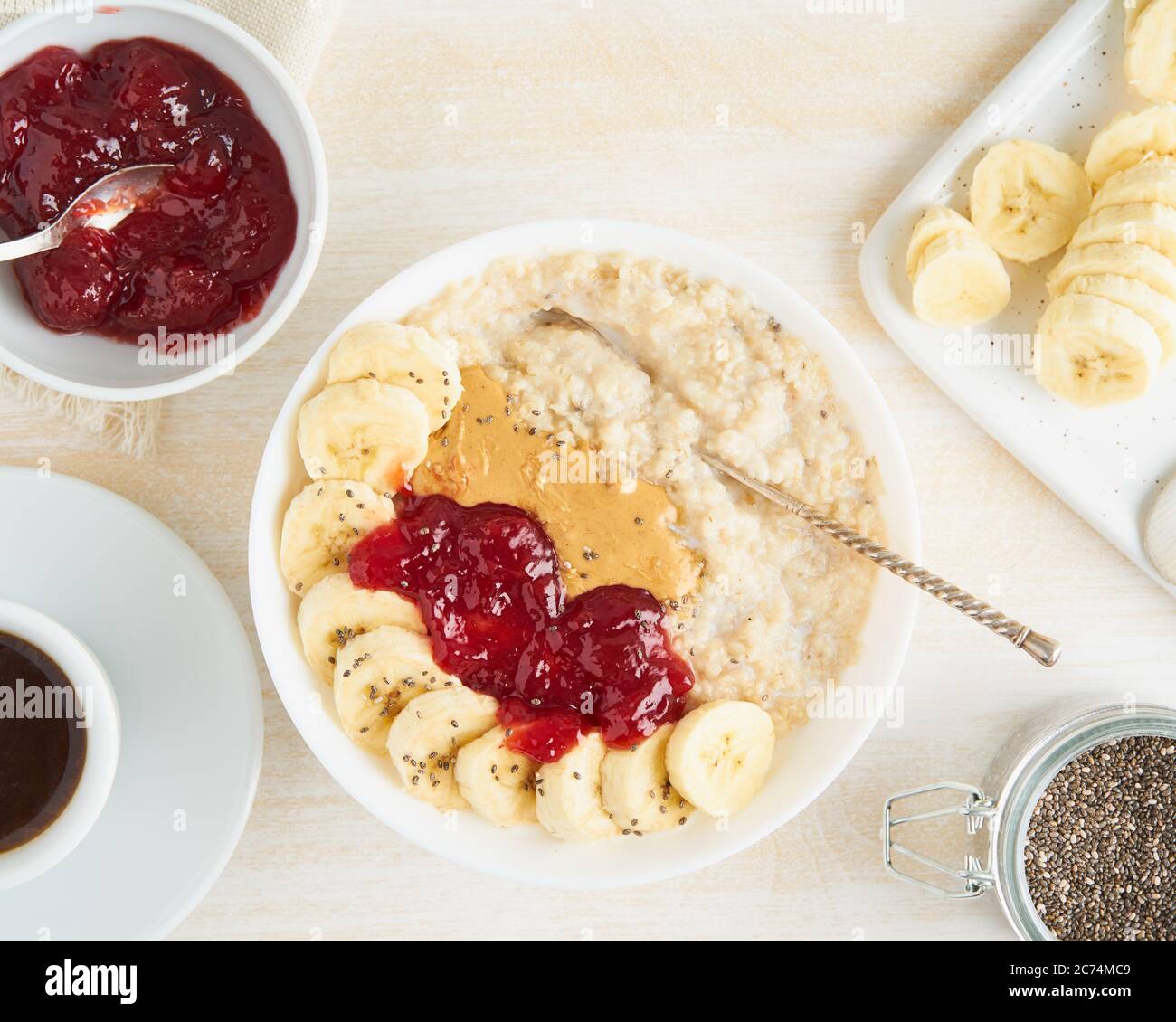 Top view of oatmeal porridge with strawberry jam, peanut butter Stock ...
