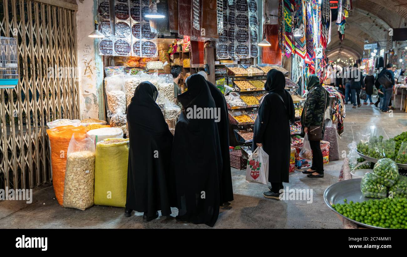 Isfahan, Iran - May 2019: Tourists and local people shopping in Bazar ...