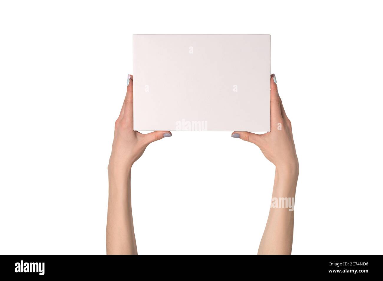 White rectangular box in female hands. Top view. Isolate Stock Photo ...