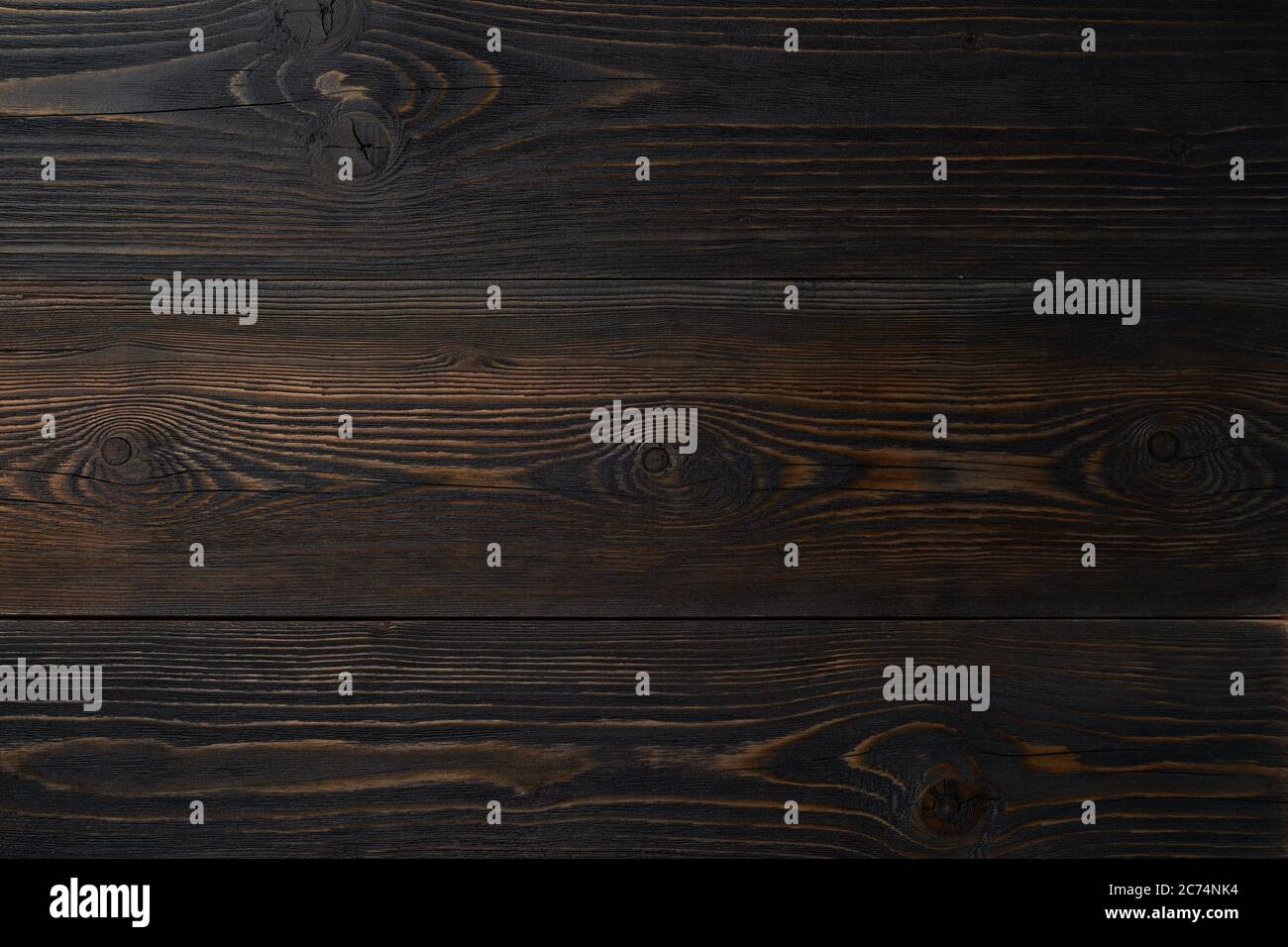 Dark wooden background with pine wood, structure of wood with knots ...