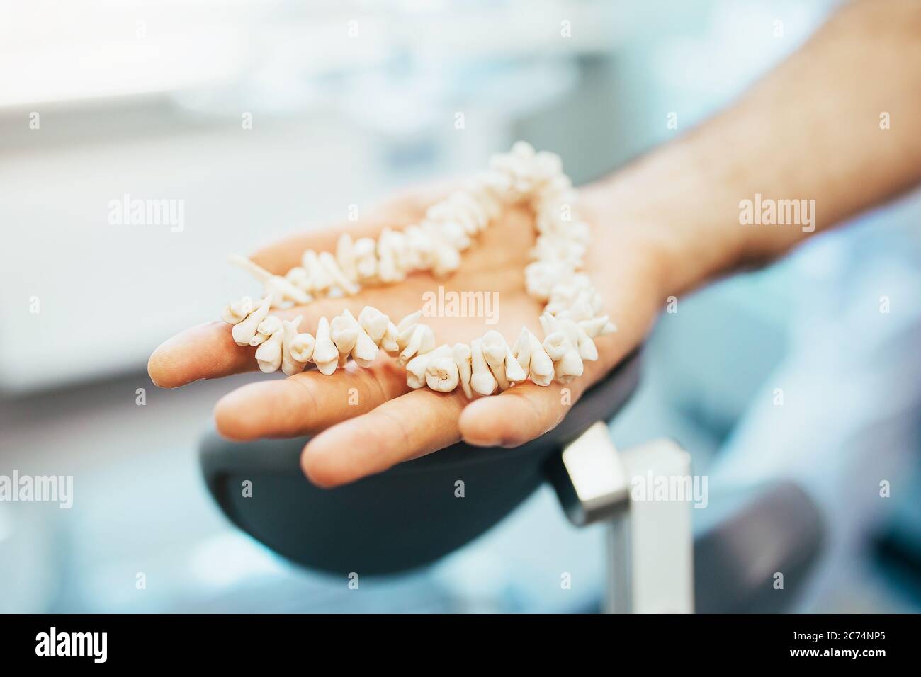Healthy human teeth in the palm of your hand - caries treatment ...