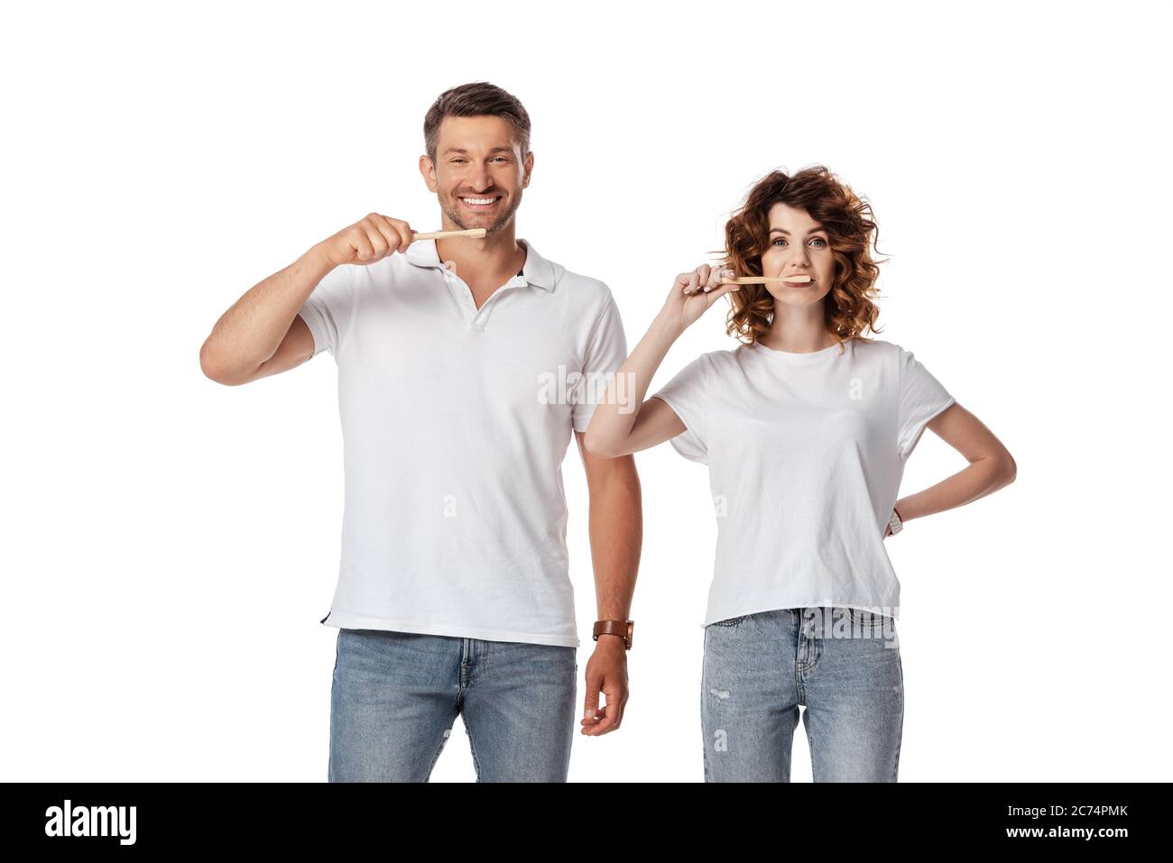 cheerful couple brushing teeth isolated on white Stock Photo - Alamy