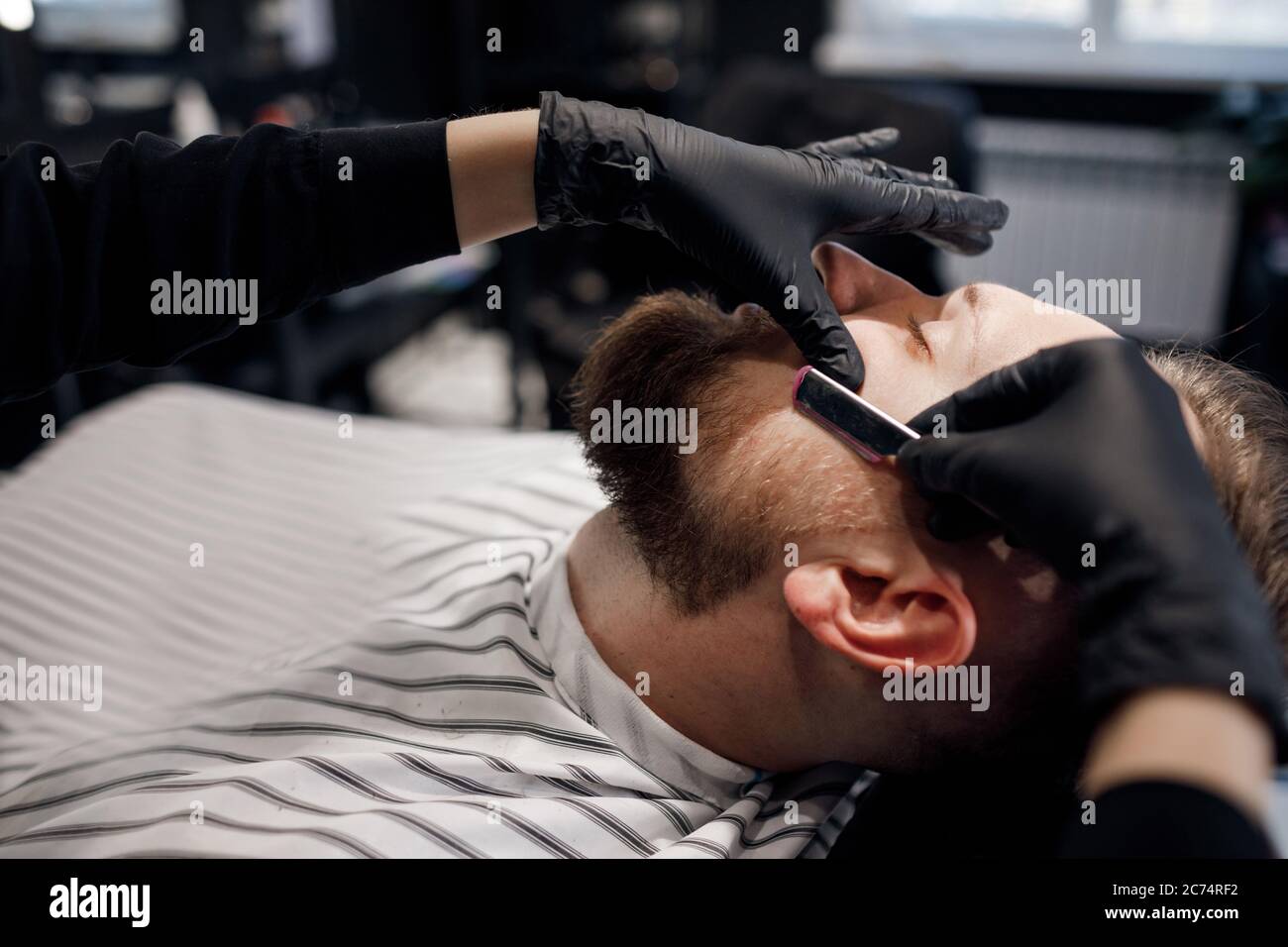 Male barber client barbershop cutting hi-res stock photography and ...