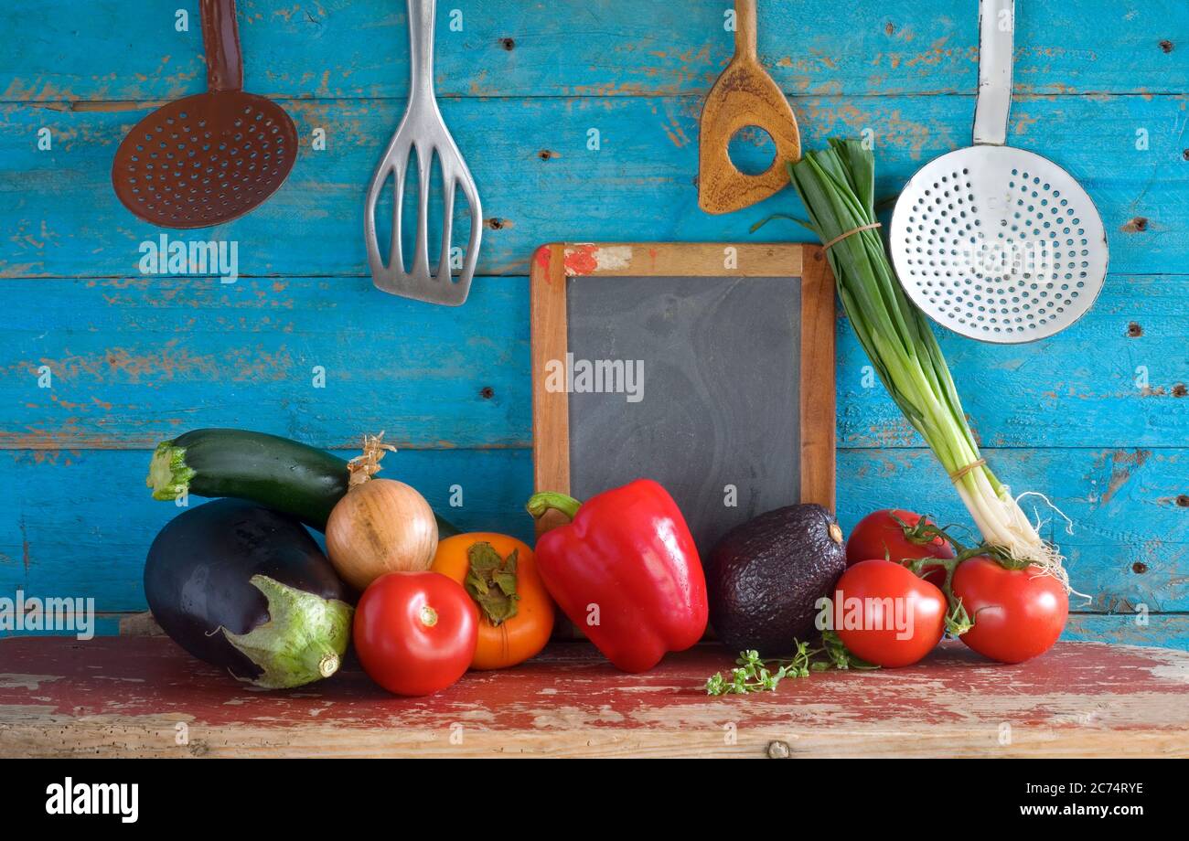 various vegetables, kitchen utensils, blackboard, free copy space Stock ...