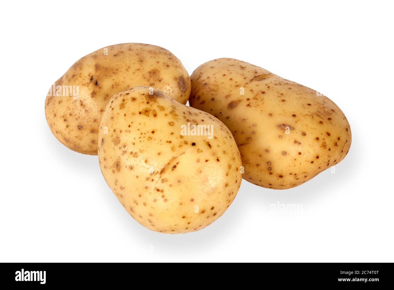 Three raw potato cut out and isolated on a white background Stock Photo ...
