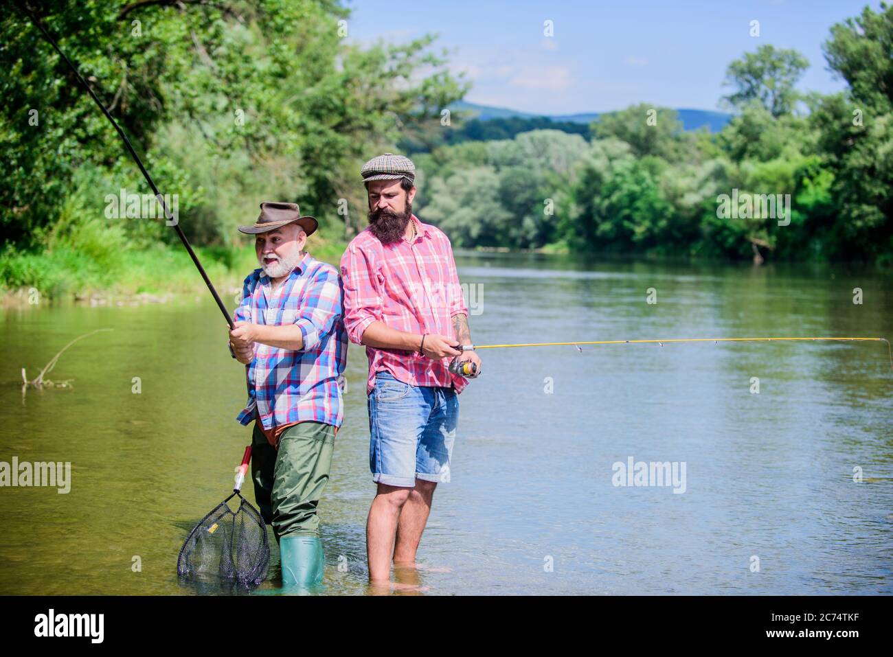 Summer weekend. Peaceful activity. Nice catch. Rod and tackle ...