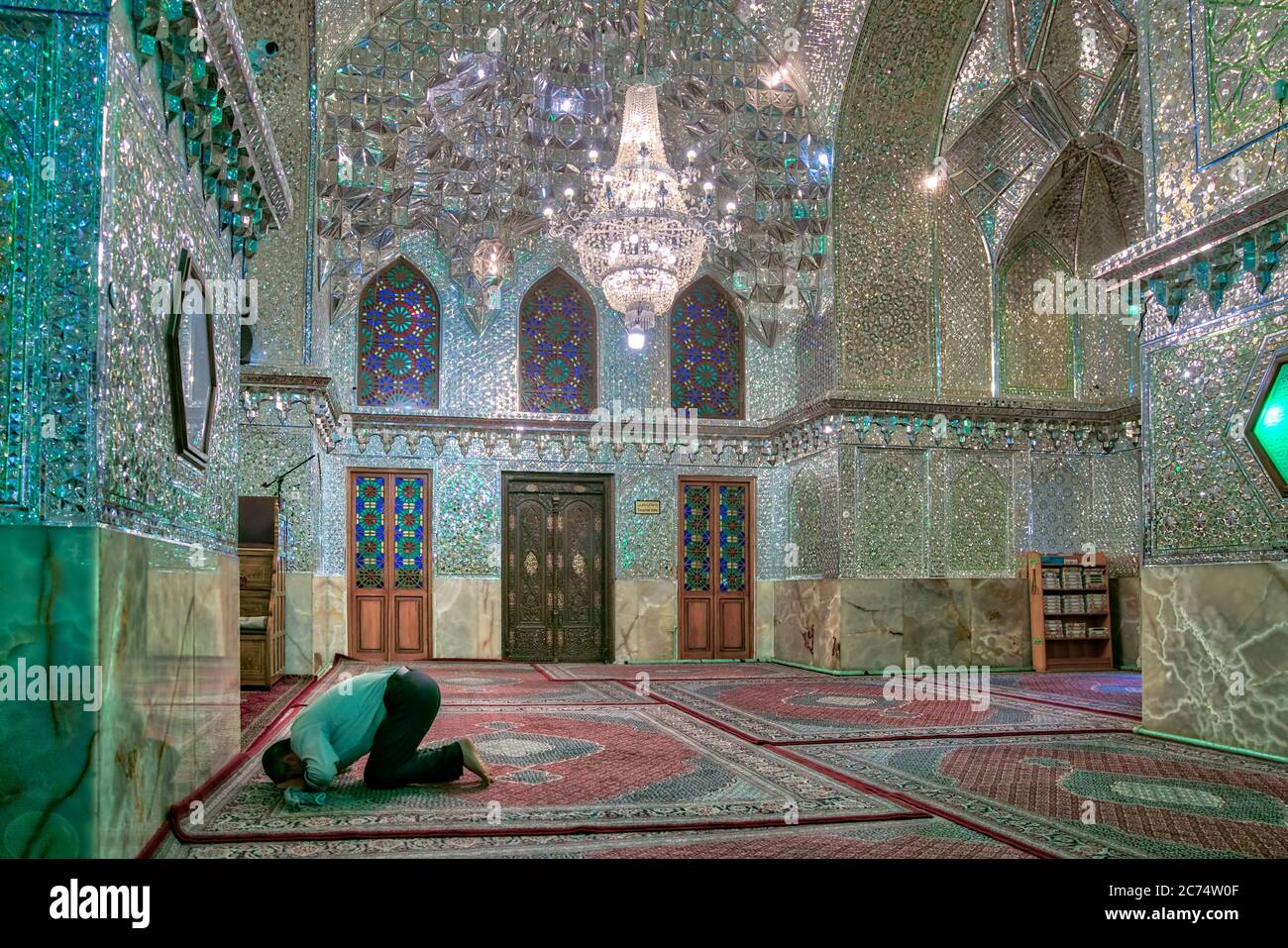 Shiraz, Iran - May 2019: Unidentified man praying inside Shah e Cheragh ...