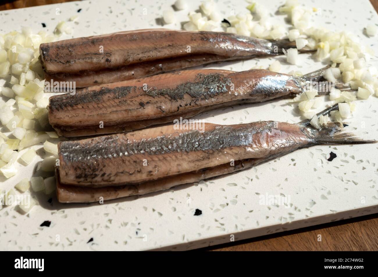 New season of Dutch herring fresh salted fish ready to eat, traditional ...