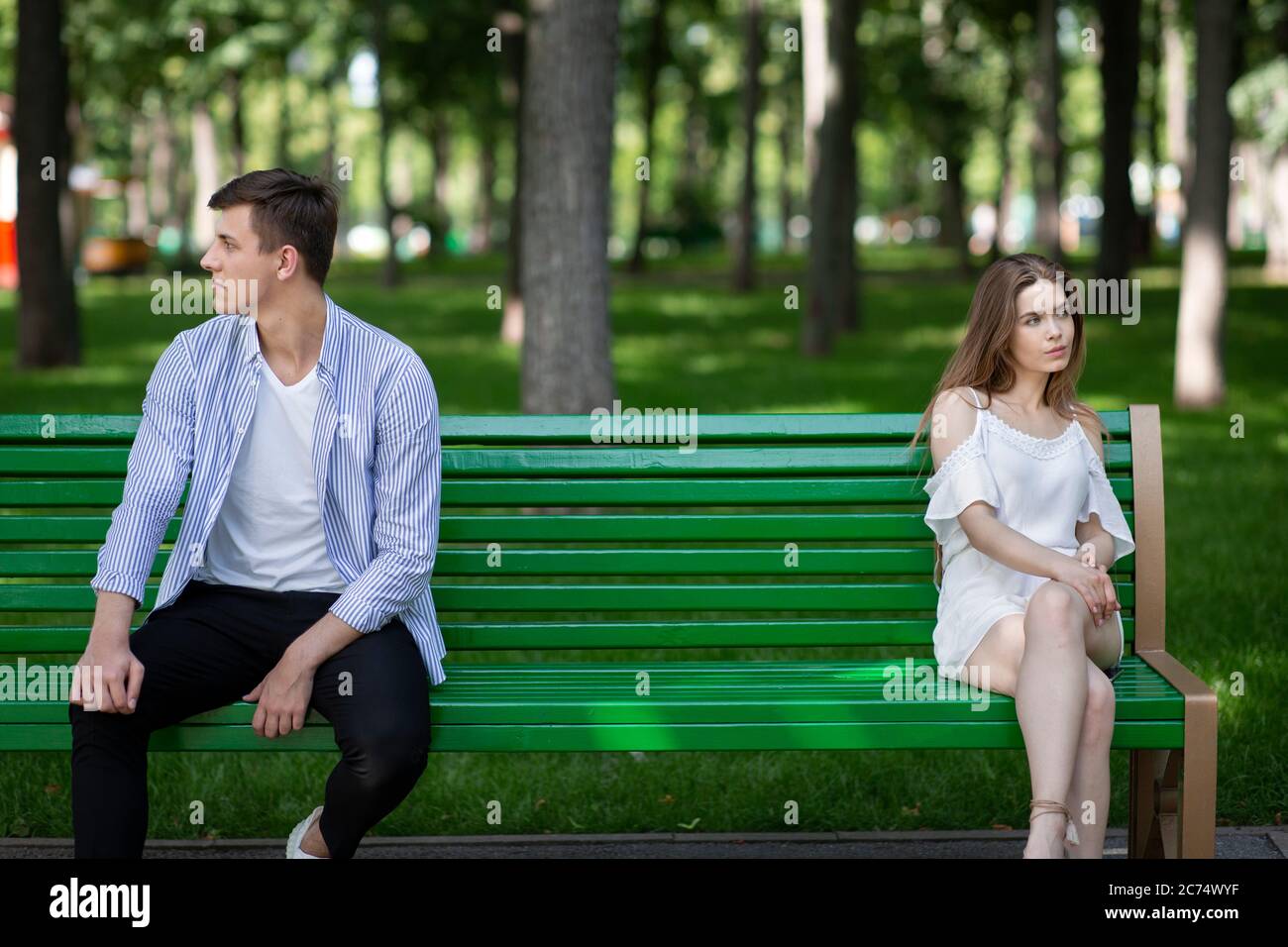 People Sitting Apart On A Bench