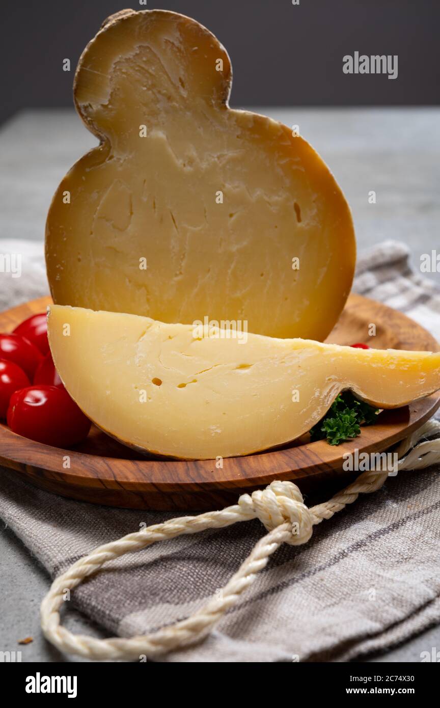 Italian semi hard matured caciocavallo cheese, handmade and aged in ...