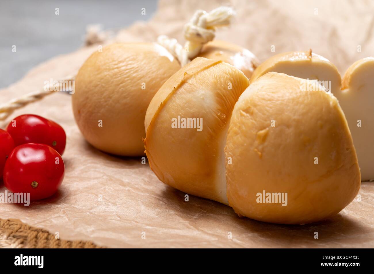 Italian semi hard handmade smoked scamorza cheese, from cow milk from ...