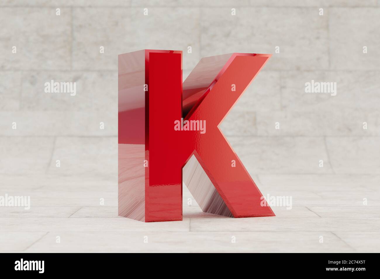 Red 3d letter K uppercase. Glossy red metallic letter on stone tile ...