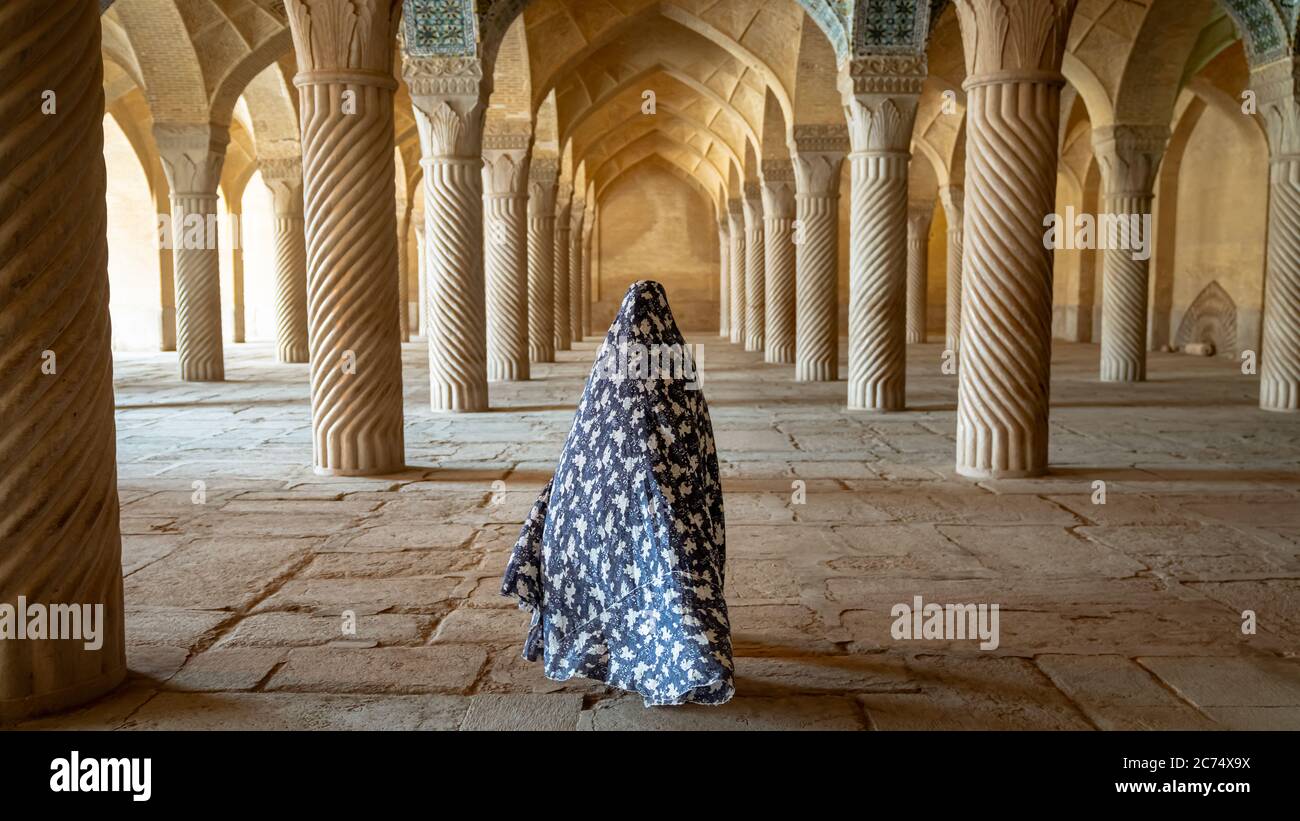 Shiraz, Iran - May 2019: Unidentified woman walking in prayer hall of ...