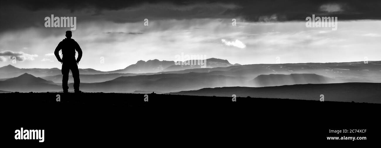 Hiking man traveler landscape Black and White Stock Photos & Images - Alamy