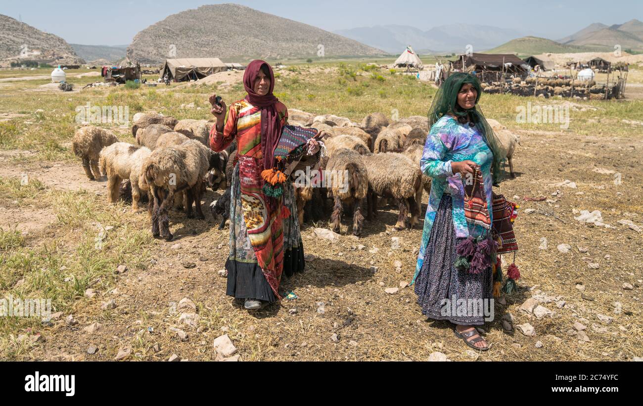 Shiraz, Iran - May 2019: Qashqai nomadic women selling handicraft ...
